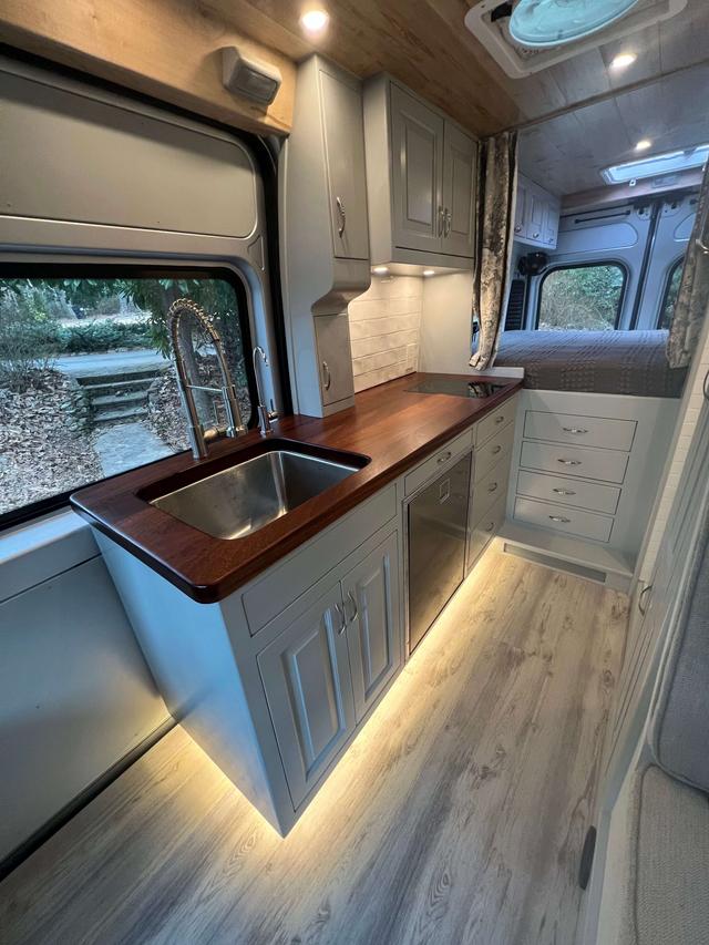 Summit Vans - About Us